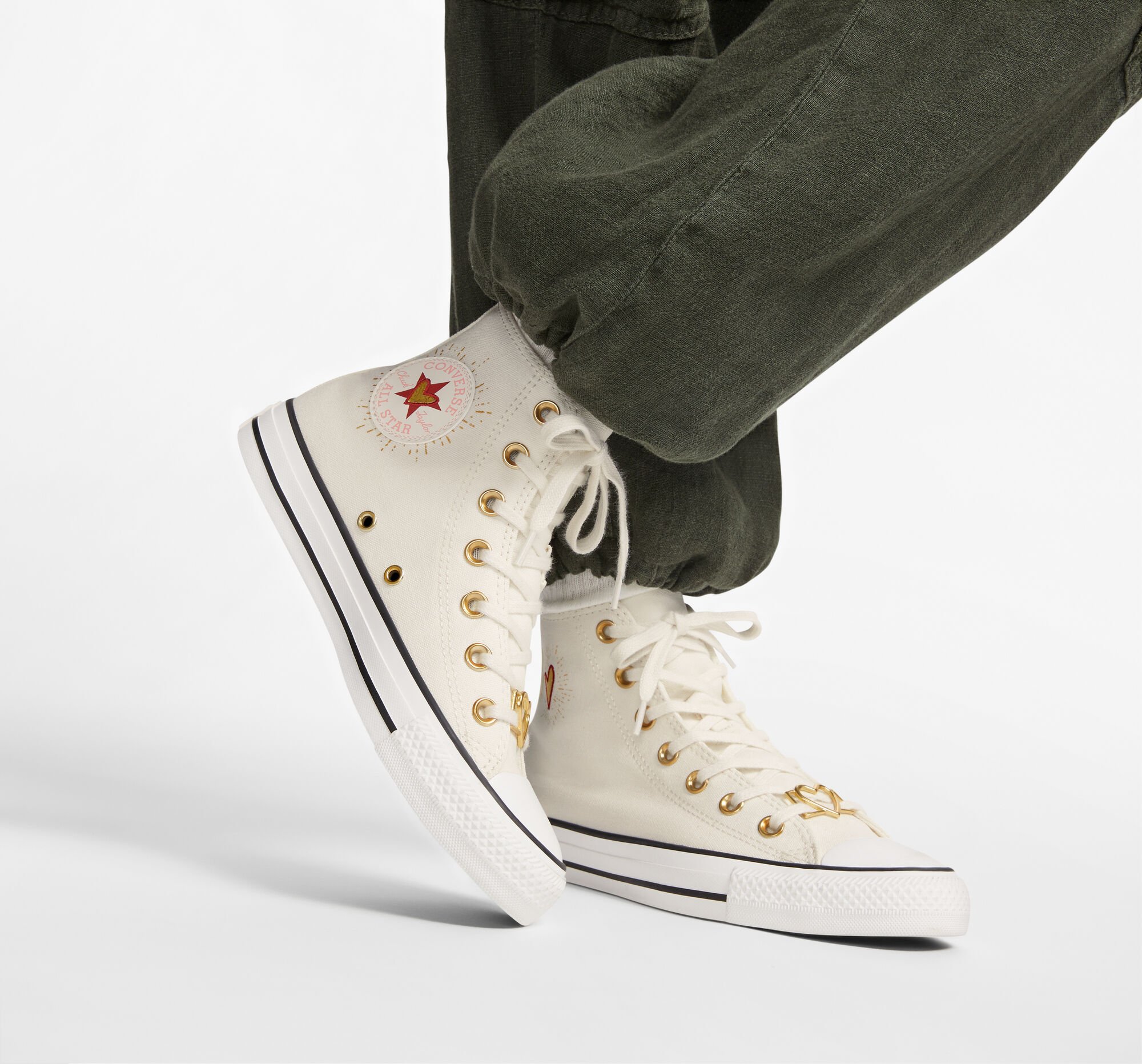 Chuck Taylor All Star Hearts Women's High Top Shoe. Converse.com