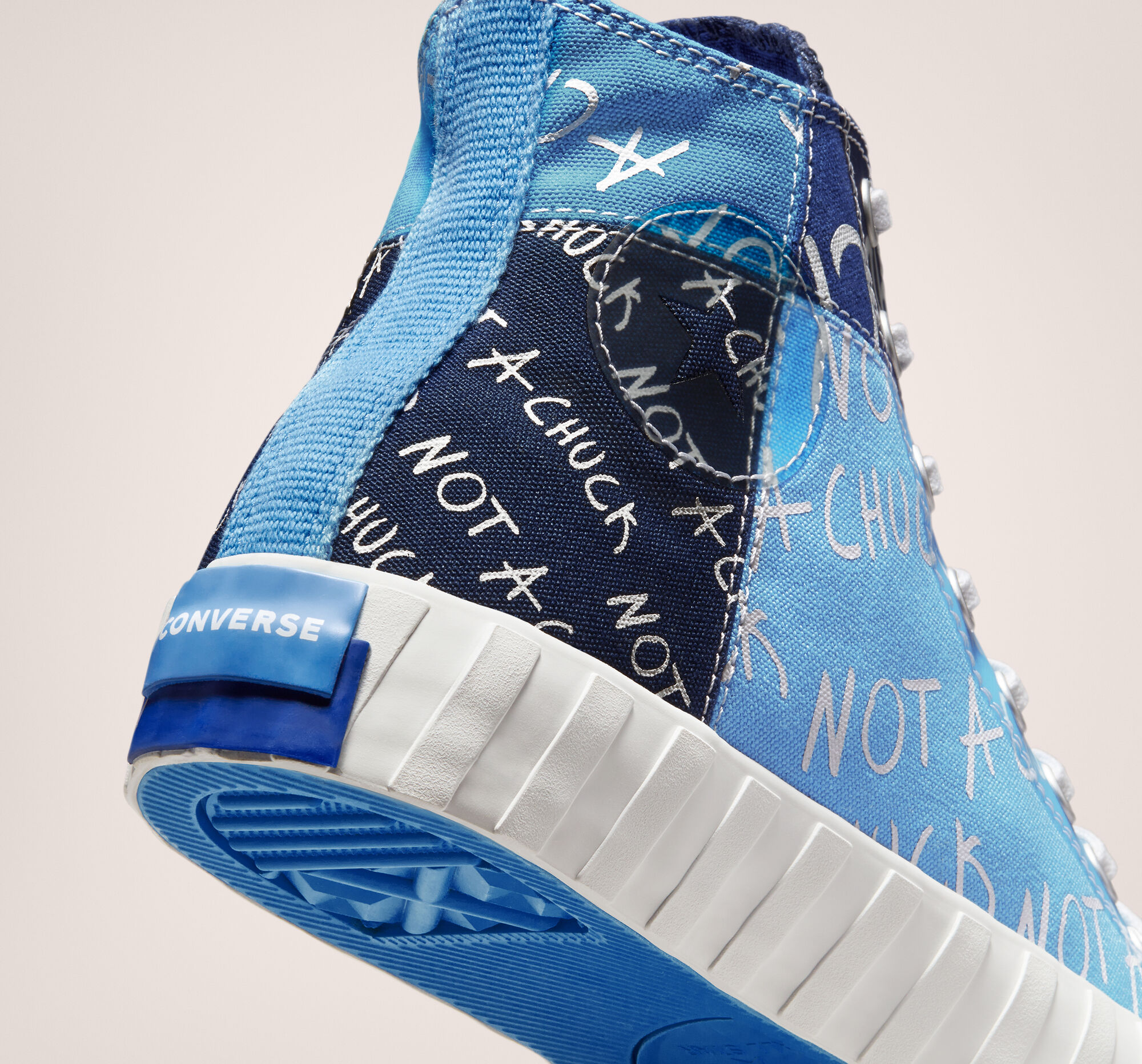UNT1TL3D Patchwork Unisex High-Top Shoe. Converse.com